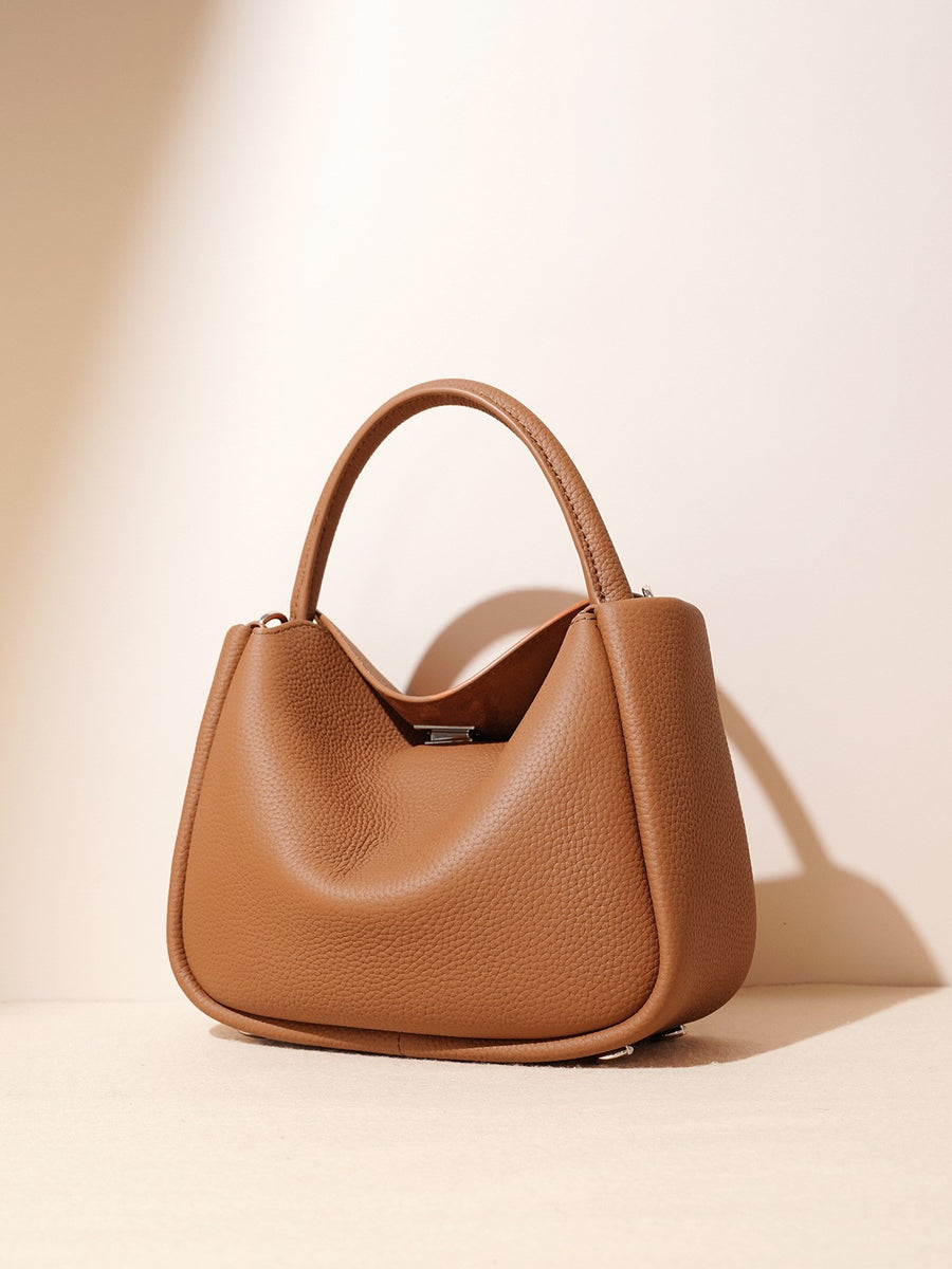 Curved Elegant Tote – Sculpted Leather Handbag – Slowliving Lifestyle